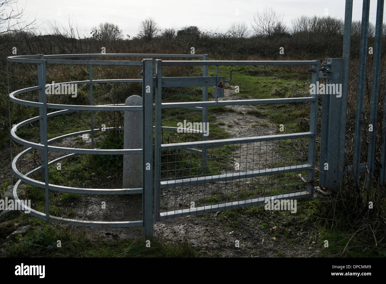 A modern metal swing gate on a footpath in West Sussex, . Picture by ...