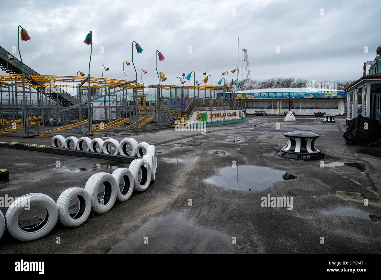 A closed and deserted fun fair in Littlehampton, West Sussex Stock ...