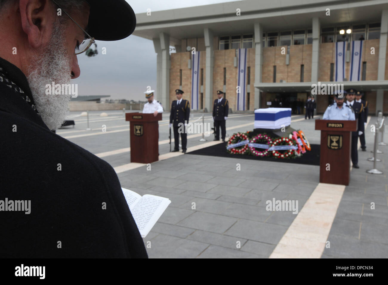 Jerusalem. 12th Jan, 2014. An Israeli Orthodox Jew pays his respect to ...