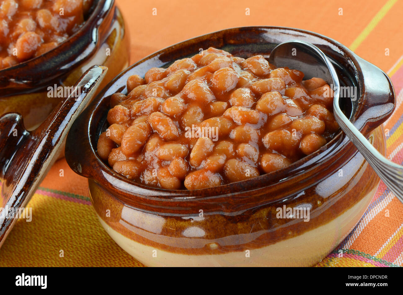 Baked beans in individual ceramic bowls Stock Photo - Alamy