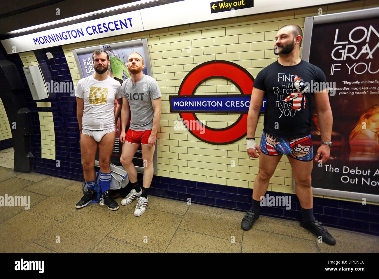 London, UK. 12th January 2014. People wearing no trousers on the London ...