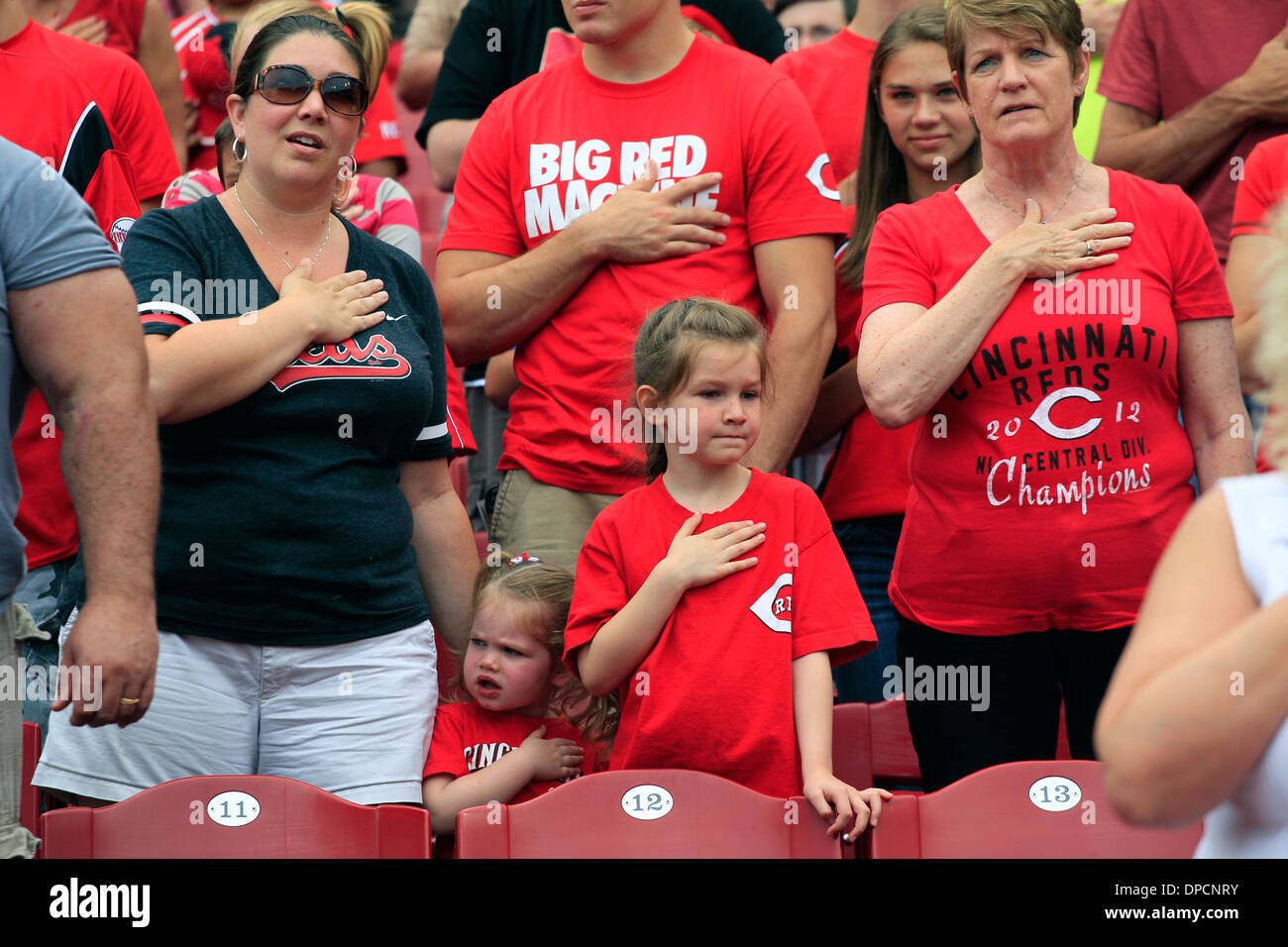Baseball fans during National Anthem hands on heart Cincinnati Ohio ...