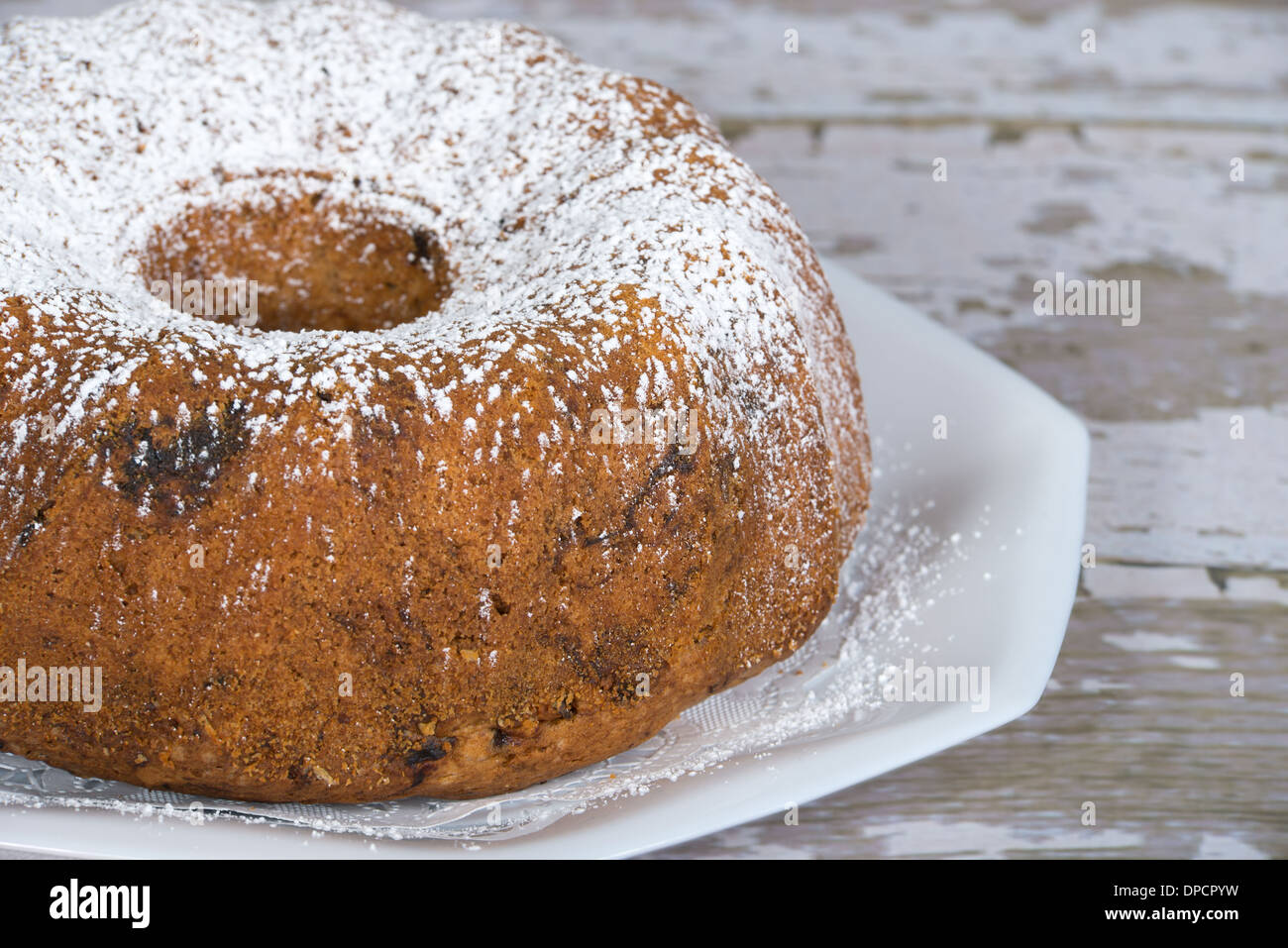 Golden brown homemade bundt cake with prunes and spices Stock Photo - Alamy