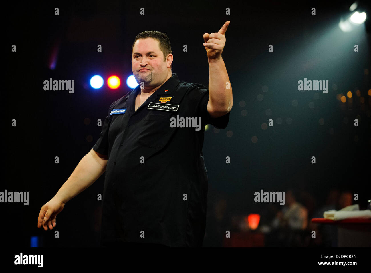 Frimley Green, UK. 12th Jan, 2014. Alan Norris (aka Chuck) celebrates ...