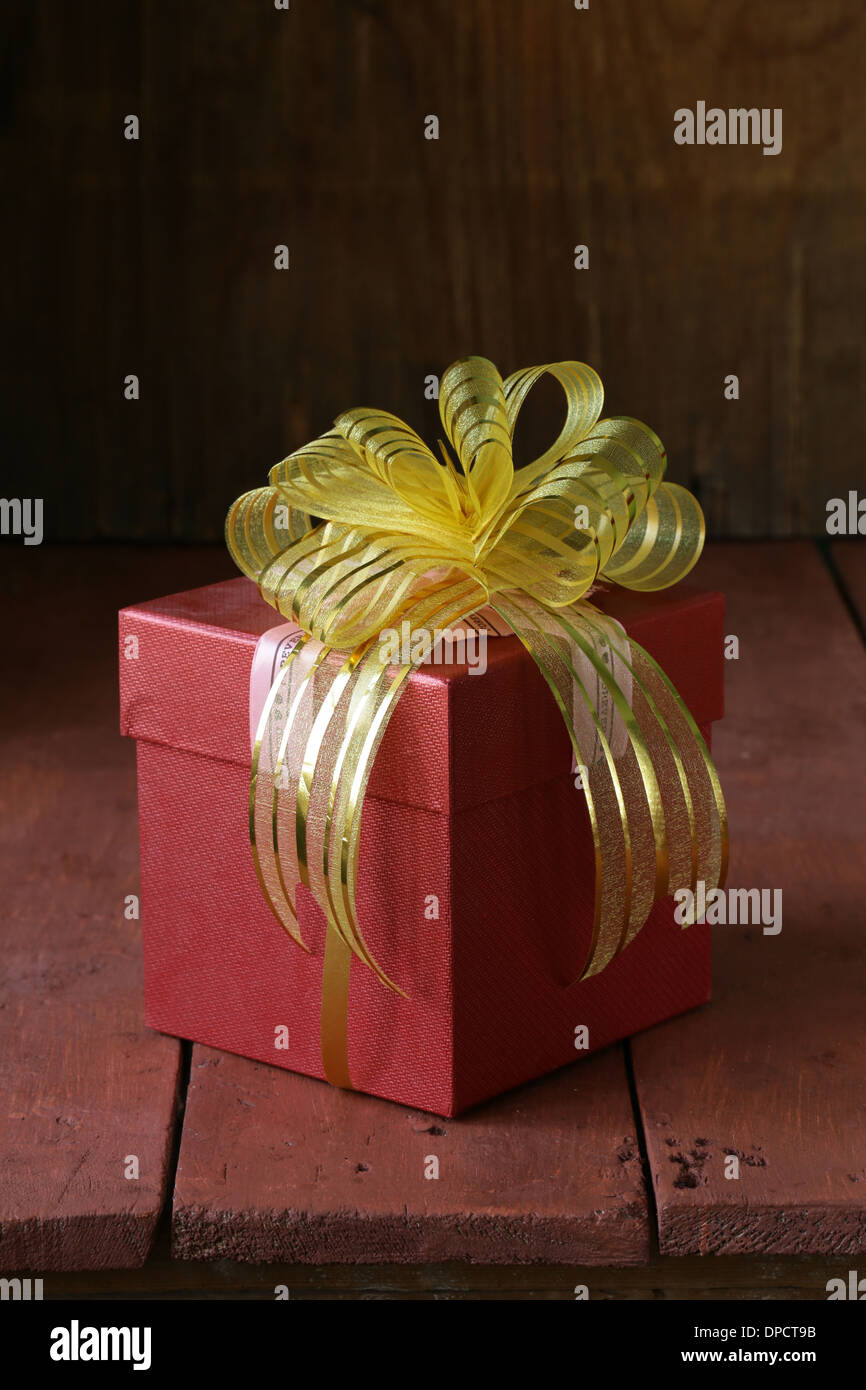 pink gift box with ribbon and decorations in vintage style Stock Photo ...