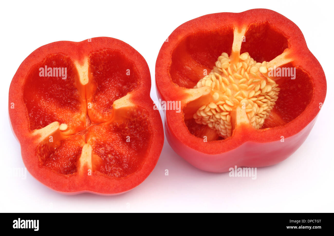 Sliced Red capsicum over white background Stock Photo - Alamy