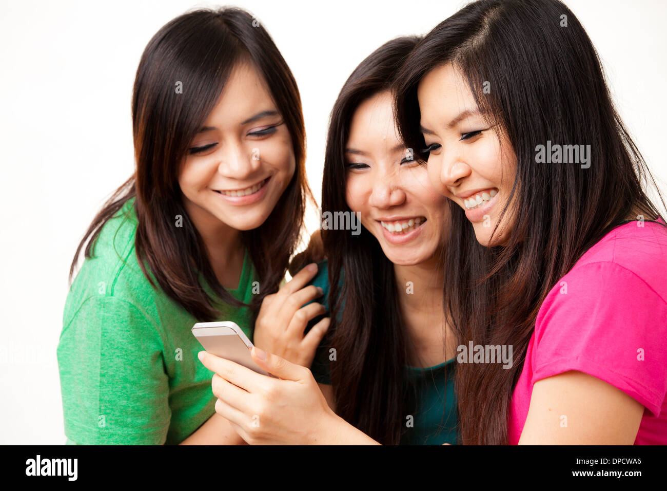 Group of Asian people enjoy their phone Stock Photo - Alamy