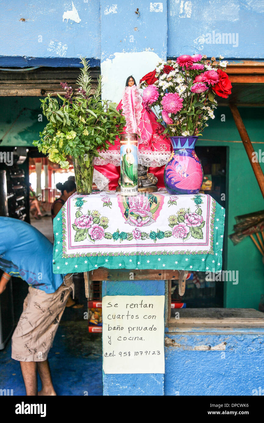 makeshift altar for Virgin of Guadalupe with fresh cloth & flowers at ...