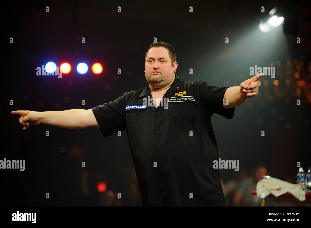 Frimley Green, UK. 12th Jan, 2014. Alan Norris (aka Chuck) celebrates ...