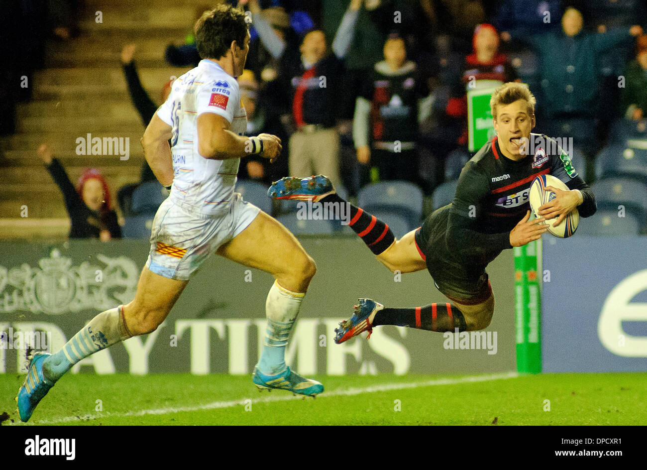 Murrayfield, Scotland, UK. 11th Jan, 2014. Tom Brown dives over the ...