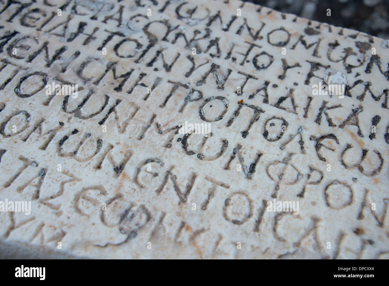Turkey, Ephesus. Ancient Ephesian ruins, marble carved text Stock Photo ...