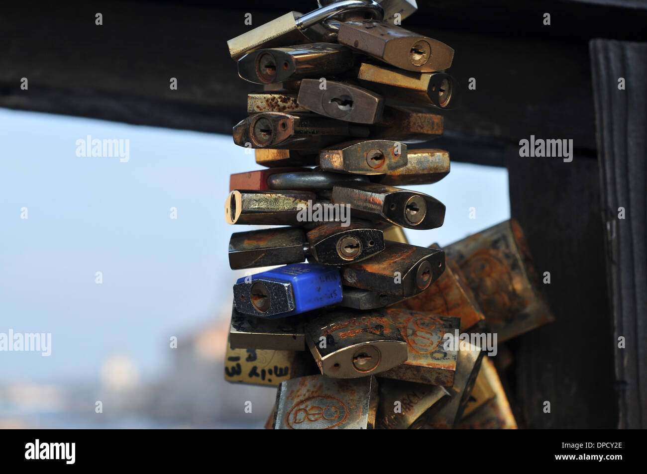 Love locks attached to a bridge railing on the Ponte dell'Accademia ...