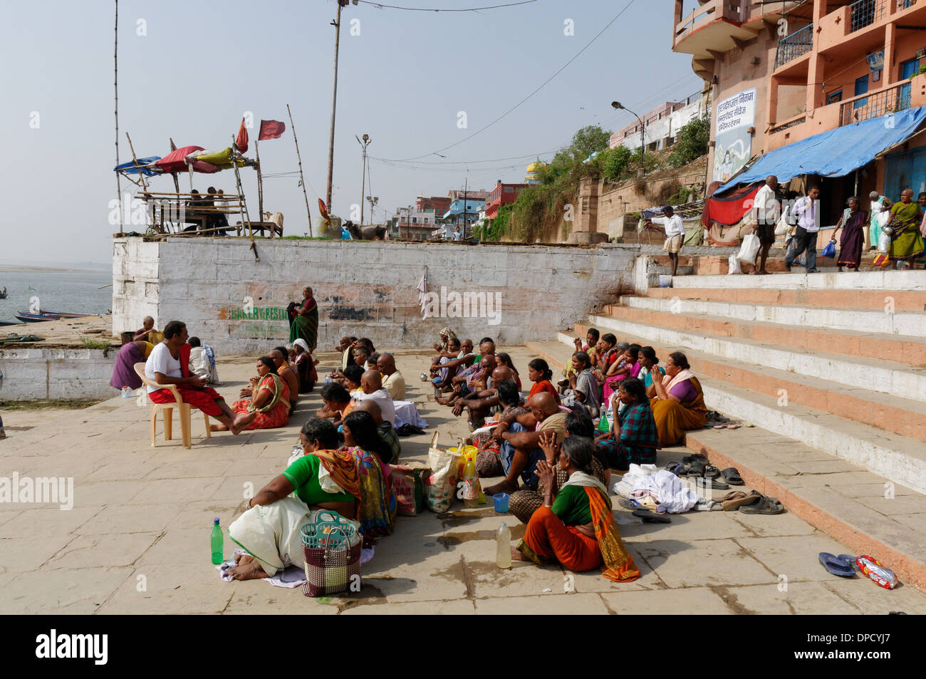 People on the ghats on the banks of the Ganges at Varanasi Stock Photo ...