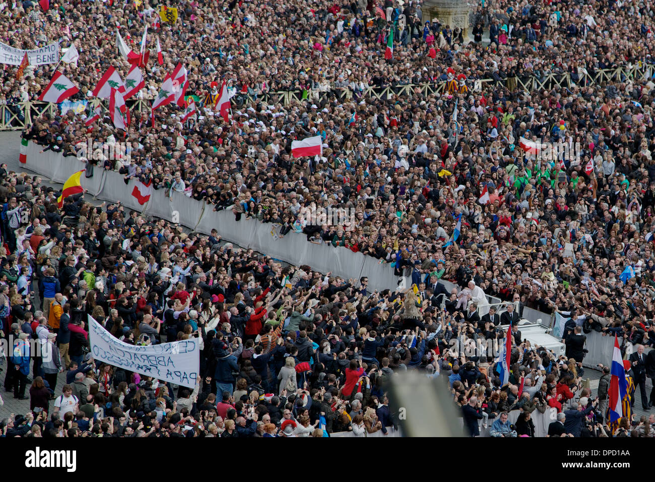 Pope Francis kisses baby from crowd, Pilgrims Easter Blessing the first ...