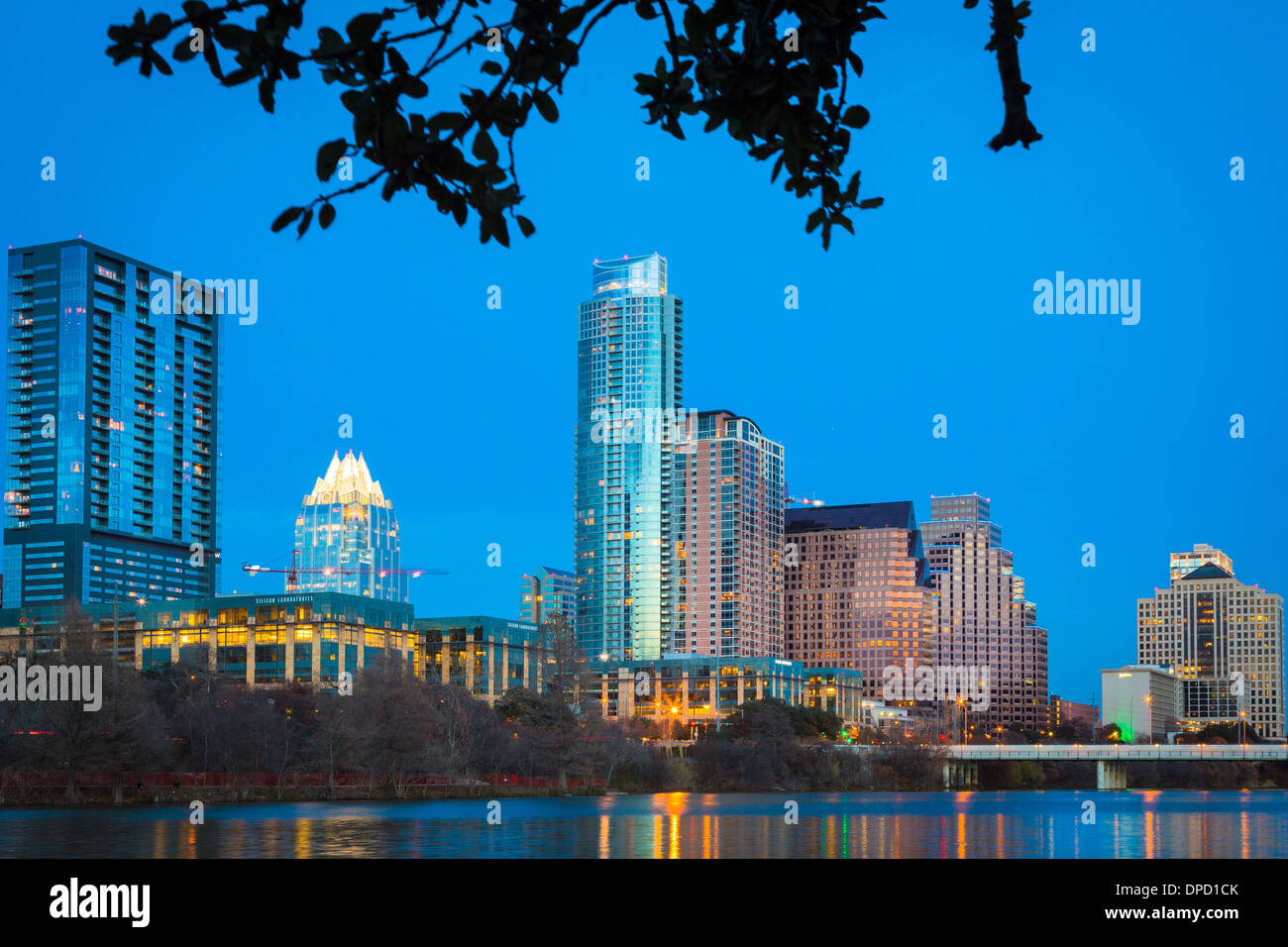 Austin skyline and the Colorado River at night Stock Photo - Alamy