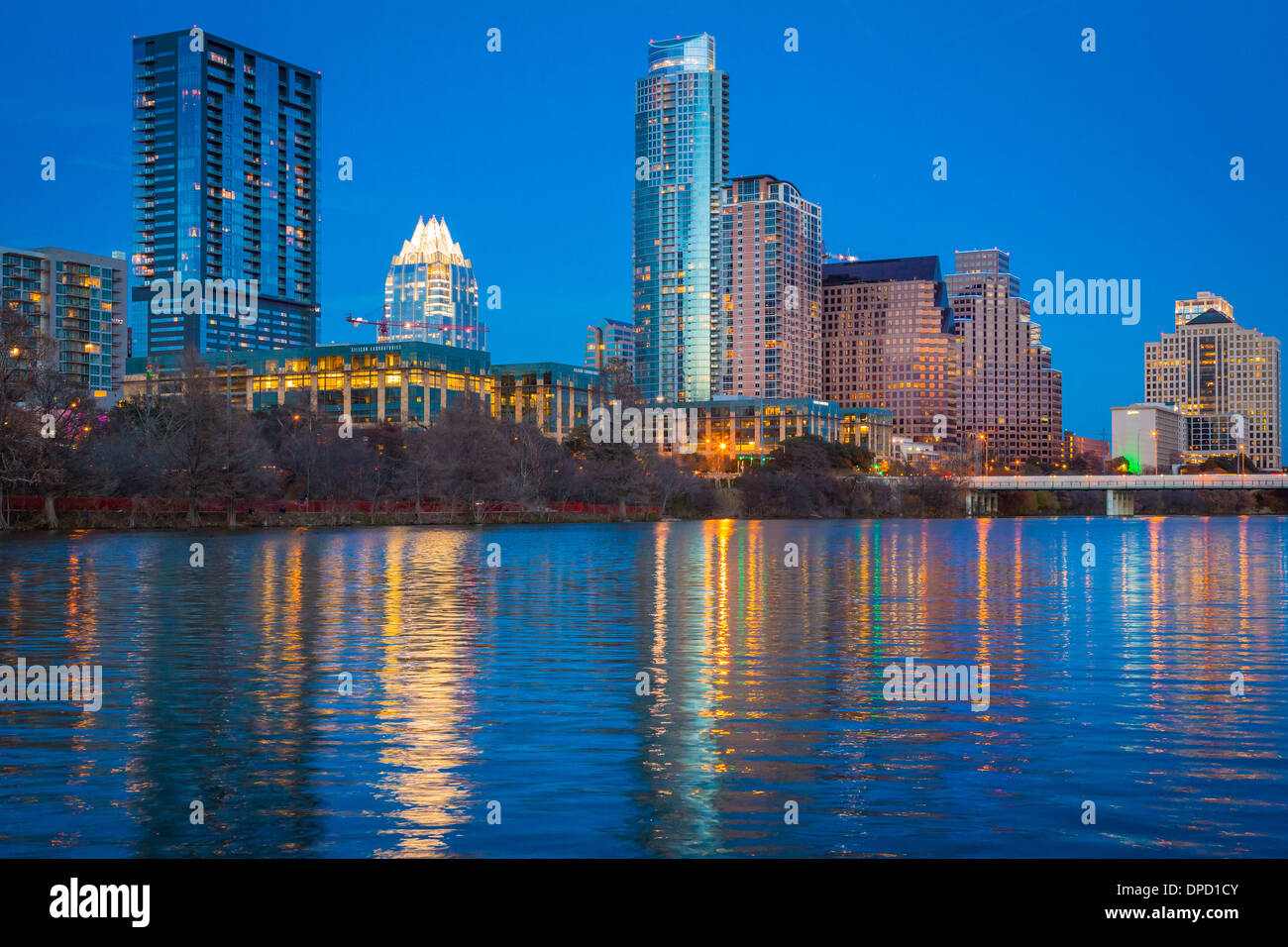 Austin skyline and the Colorado River at night Stock Photo - Alamy