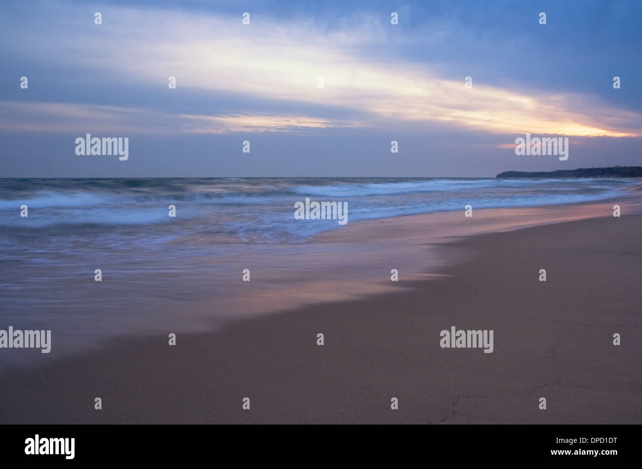 sunset on beach landscape Stock Photo - Alamy