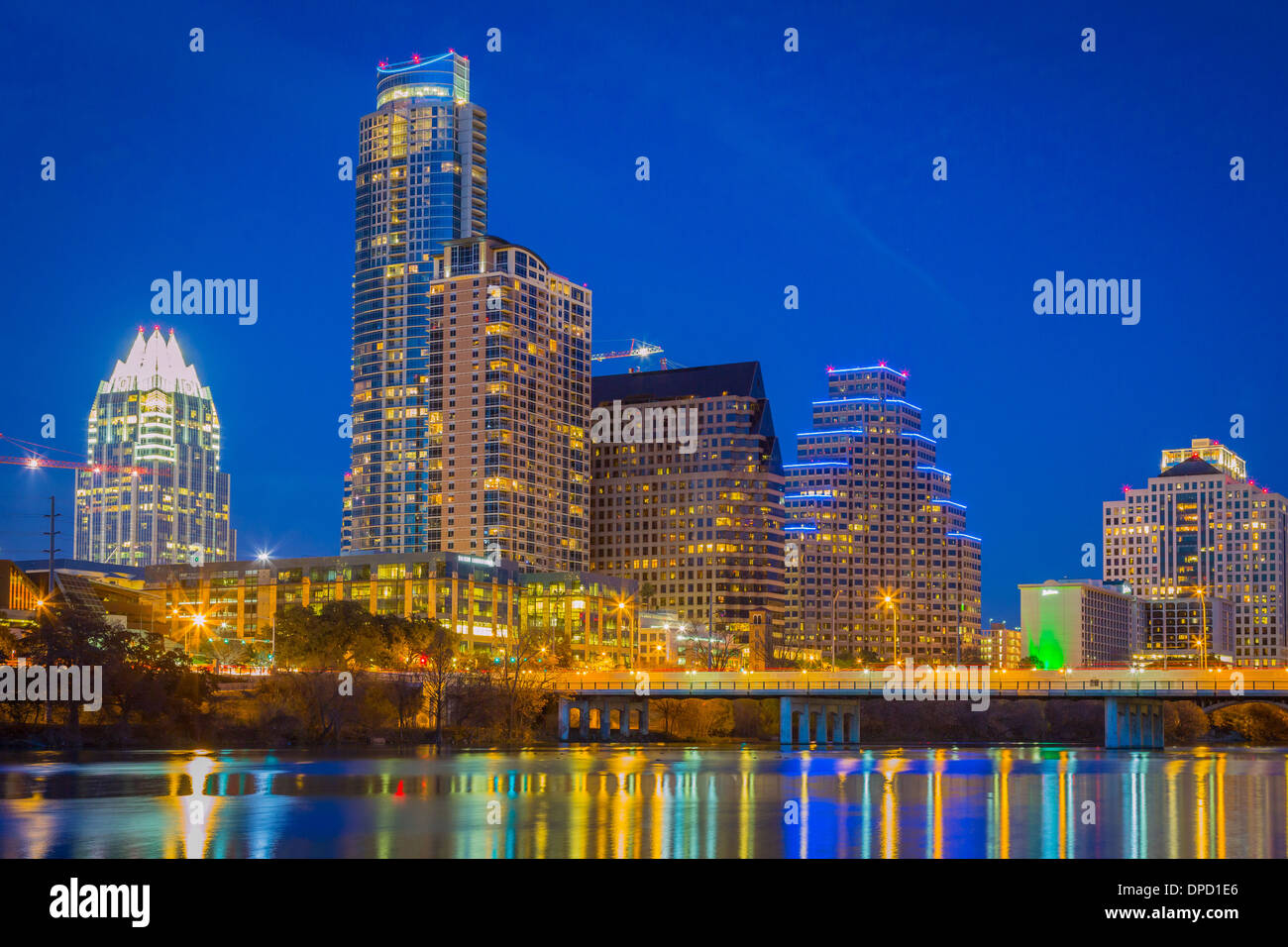 Austin skyline and the Colorado River at night Stock Photo - Alamy