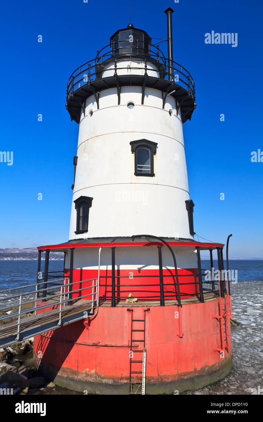 Red and White Sleepy Hollow Lighthouse against a deep blue sky on the ...