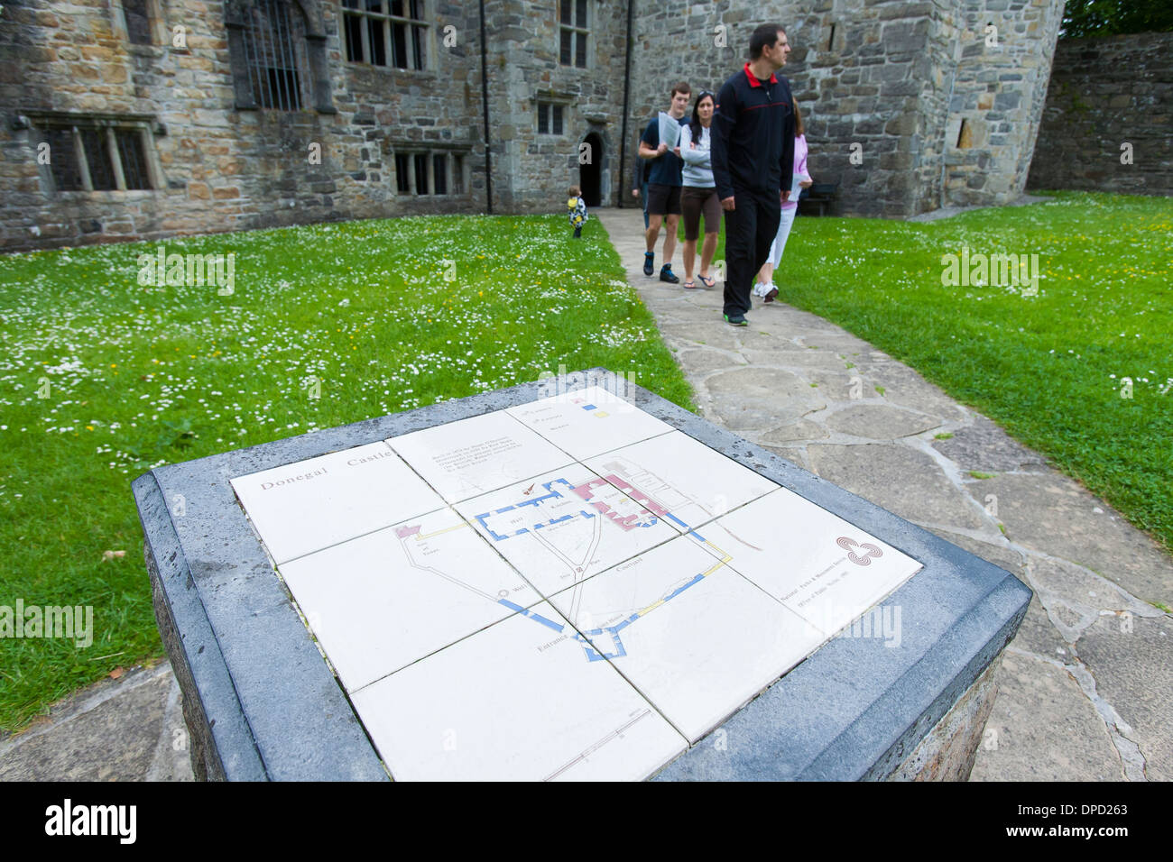 A plinth with a tiled map of donegal castle outside the entrance in ...
