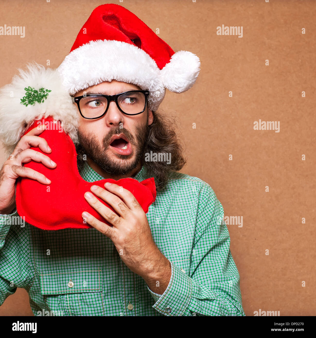 handsome man dressed as Santa Claus Stock Photo - Alamy