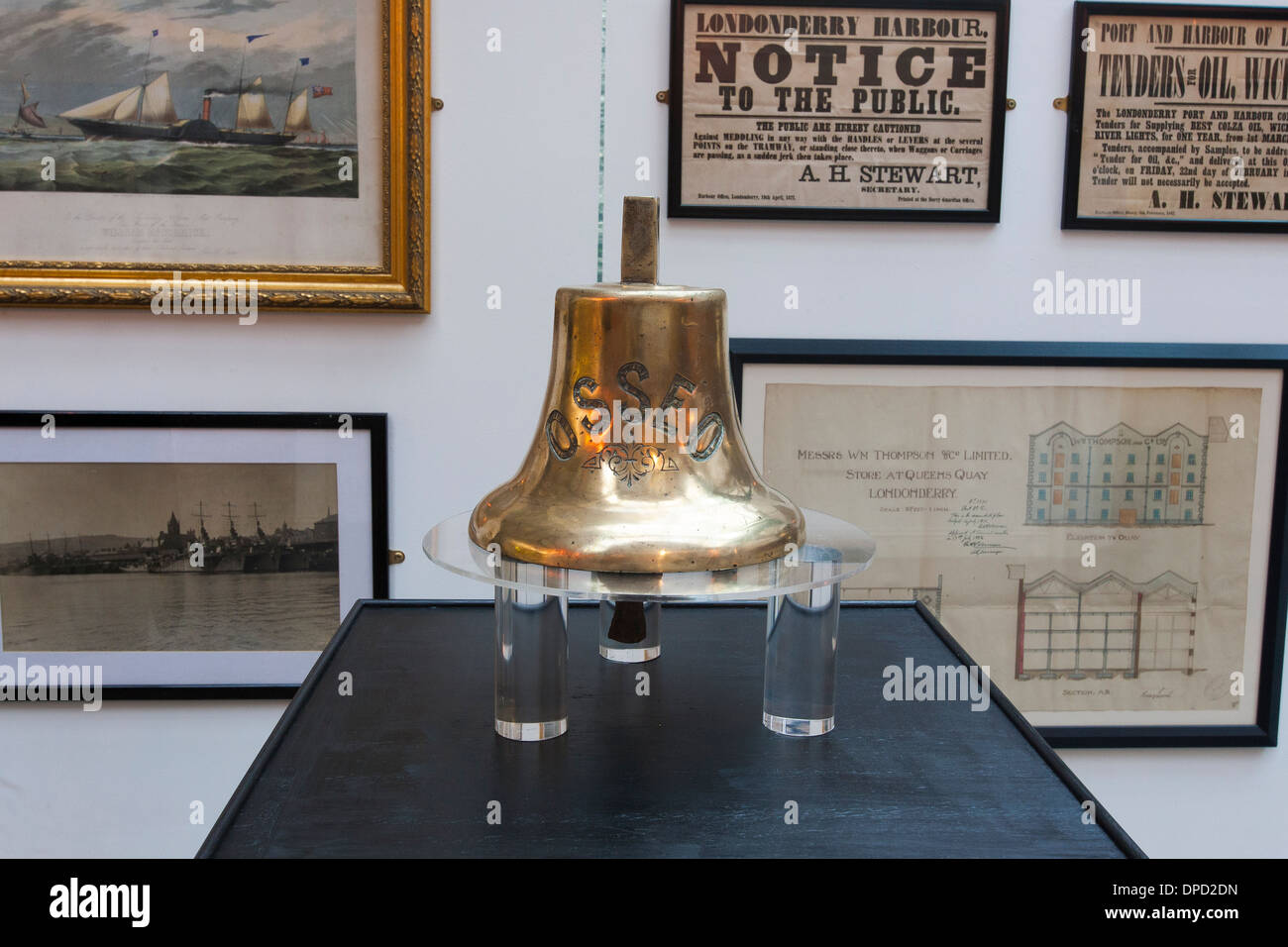 A ships bell on display with other maritime paraphanelia inside the ...