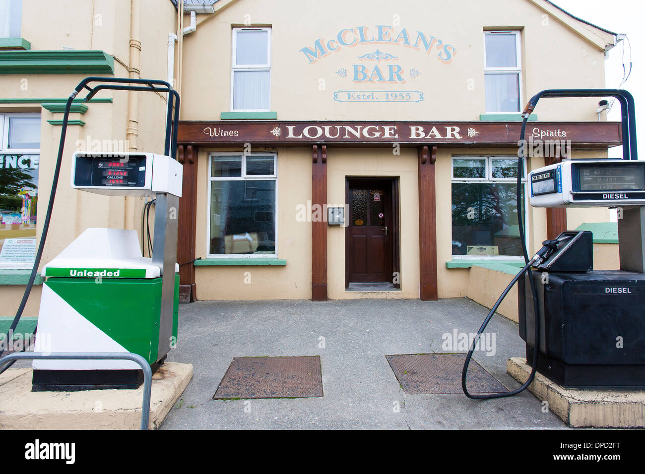 A petrol station and village pub in front of village of Malin in ...