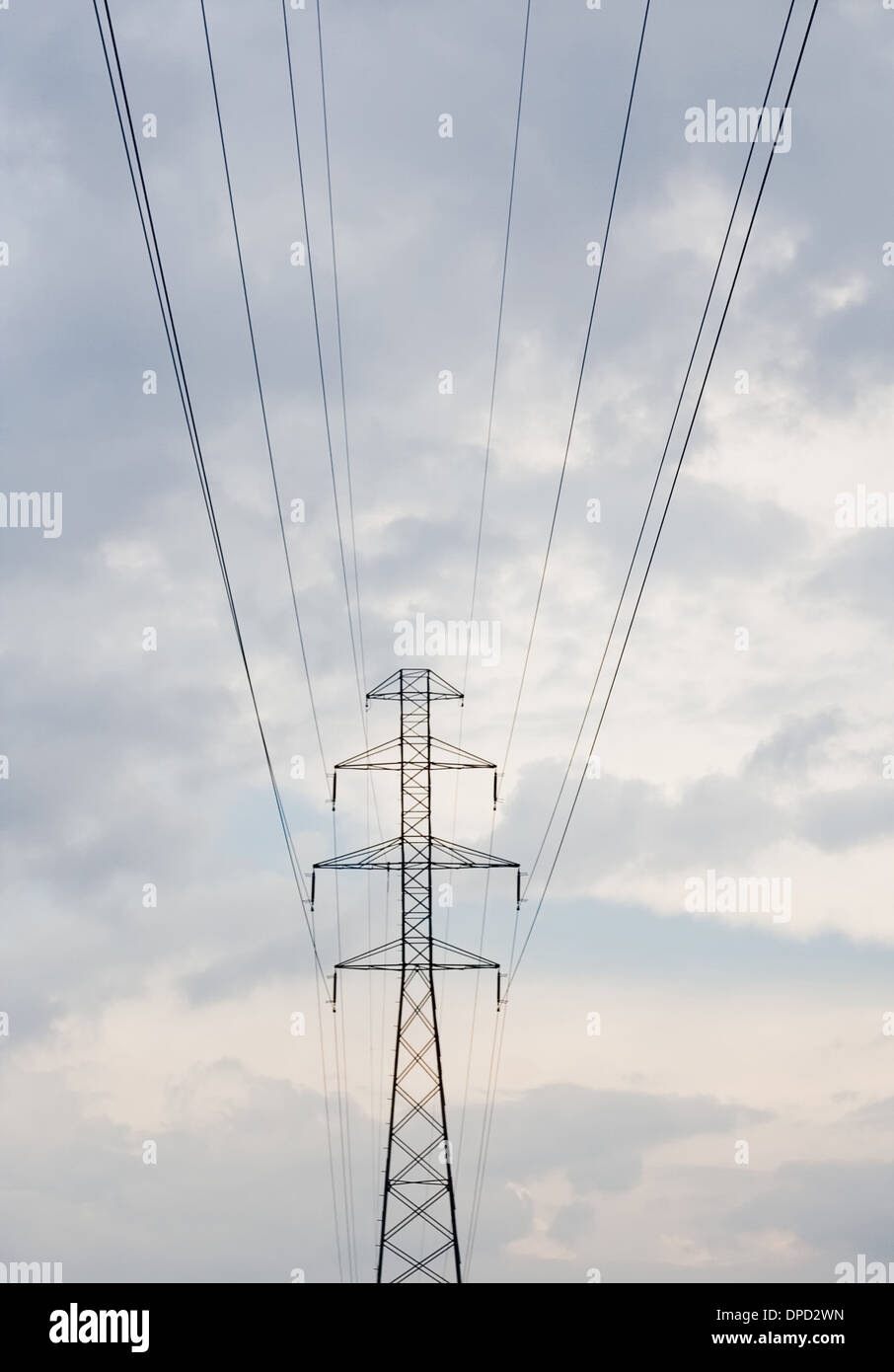 Power pole on sunset sky background Stock Photo - Alamy