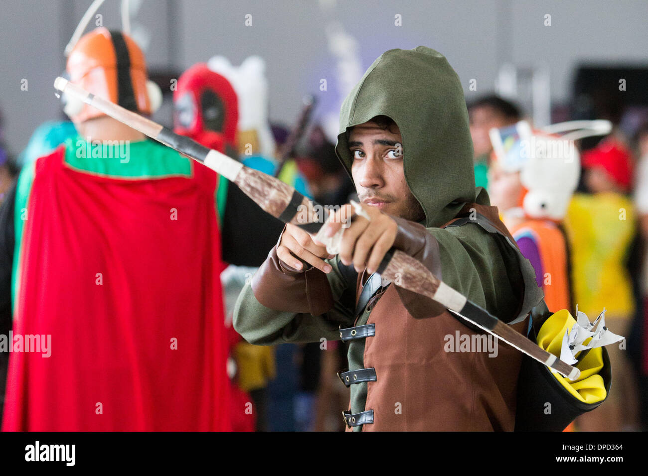Rio De Janeiro, Brazil. 12th Jan, 2014. A cosplayer poses at an ...