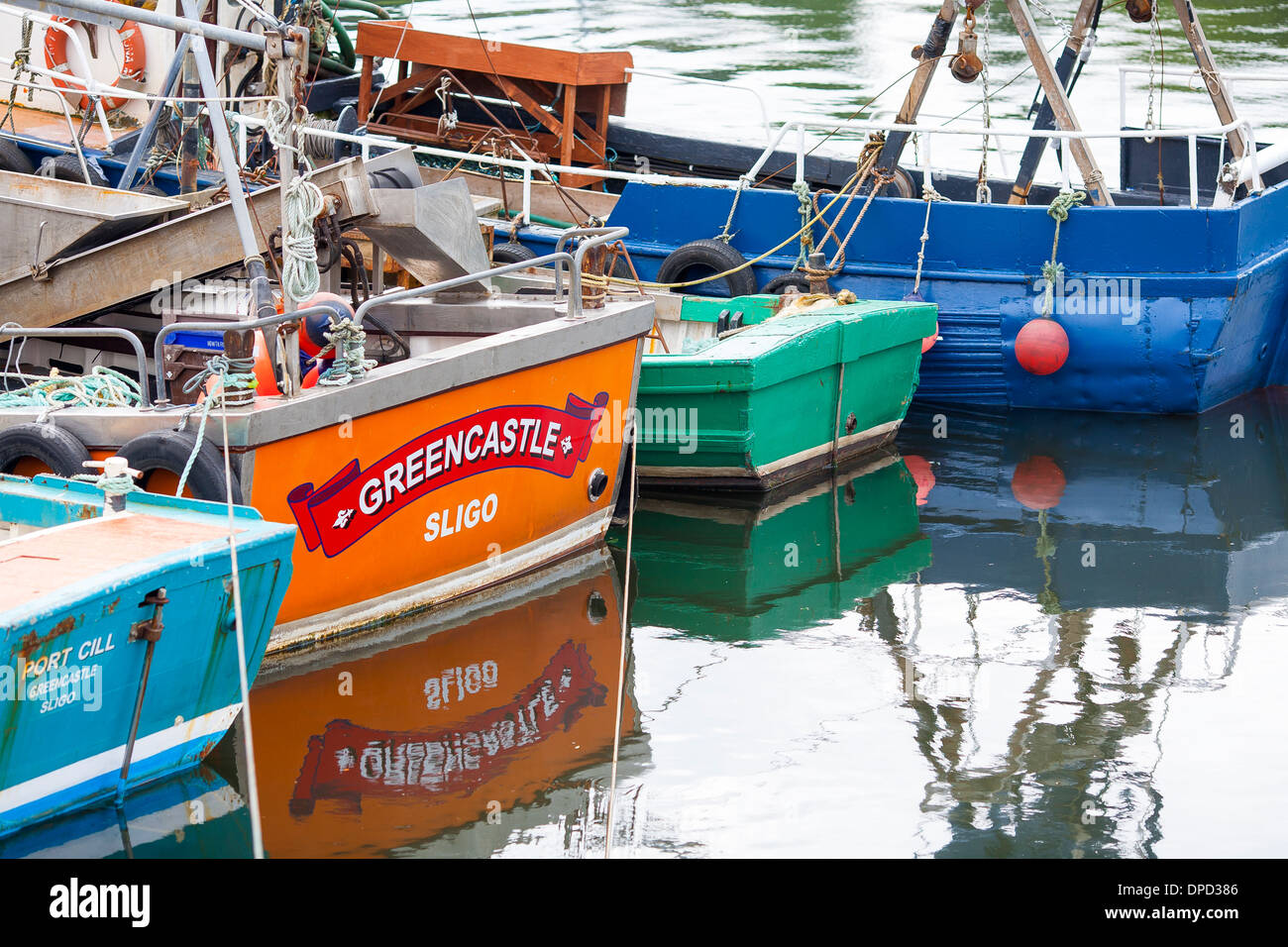 Fishing boats in a line hi-res stock photography and images - Alamy