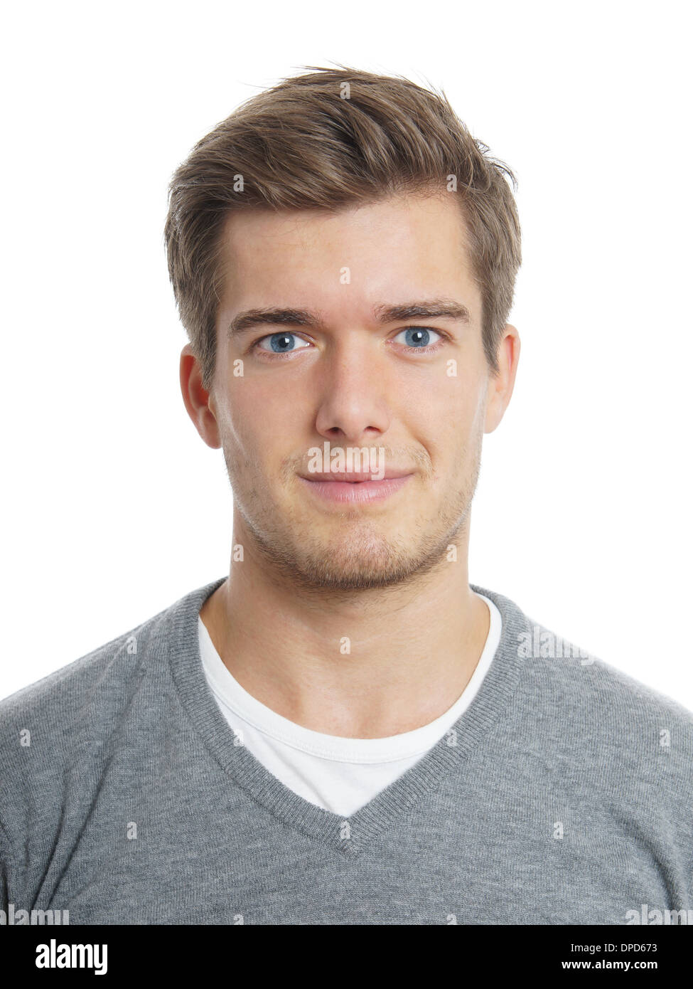 young man with neutral expression Stock Photo - Alamy