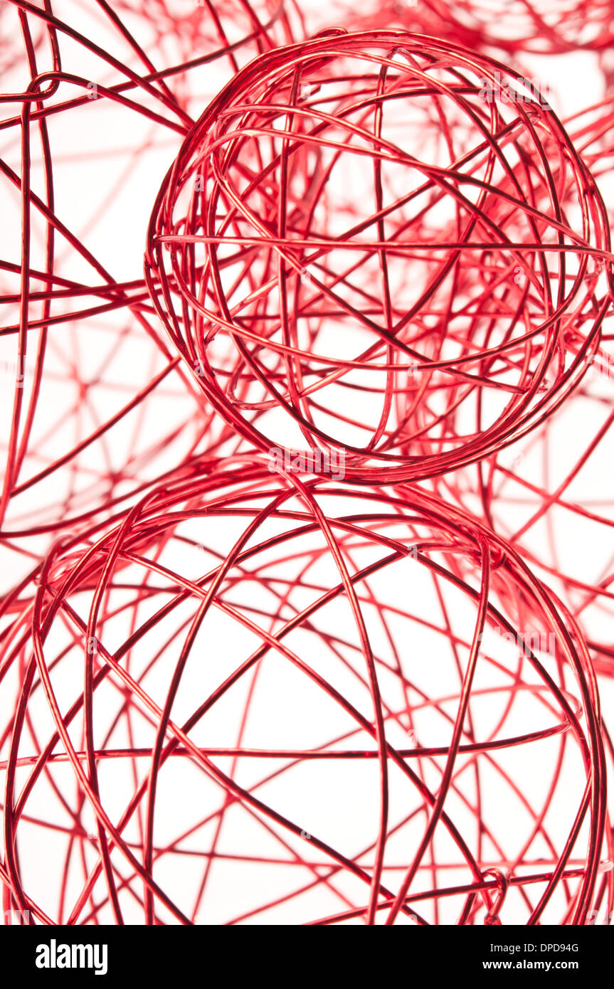 red spheres made of wires on white Stock Photo - Alamy