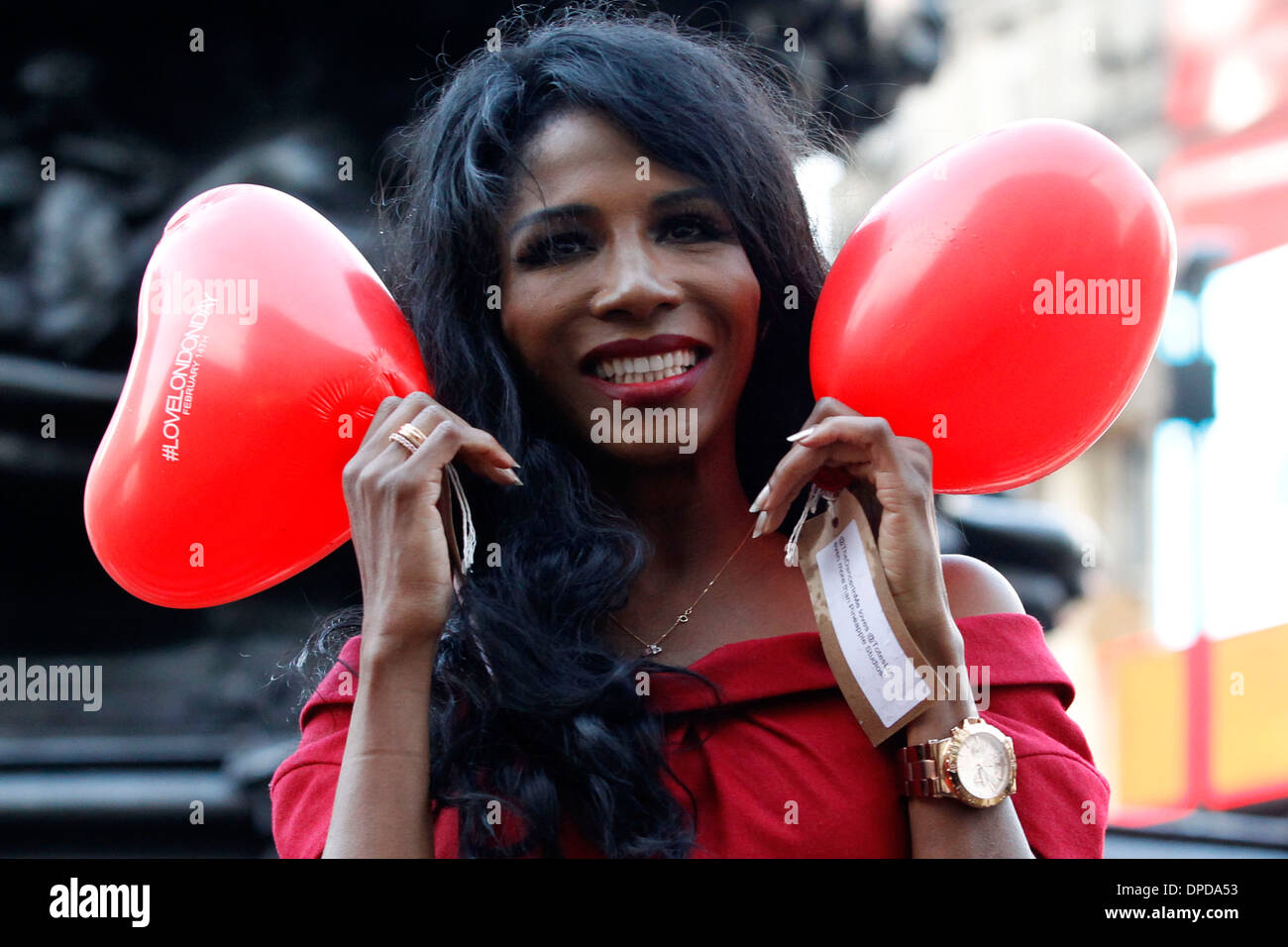 British-American singer Sinitta poses with red balloons for a ...