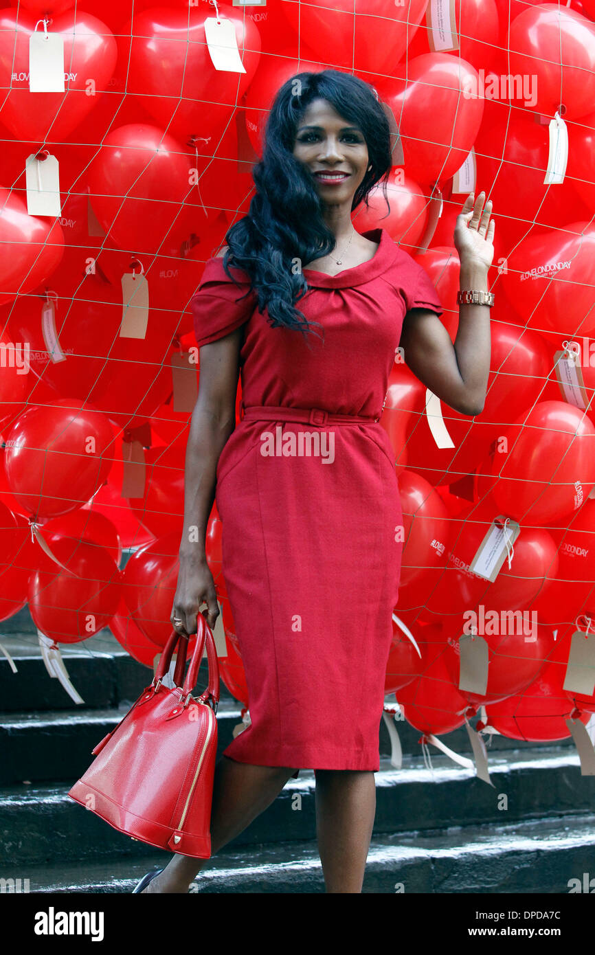 British-American singer Sinitta poses with red balloons for a ...