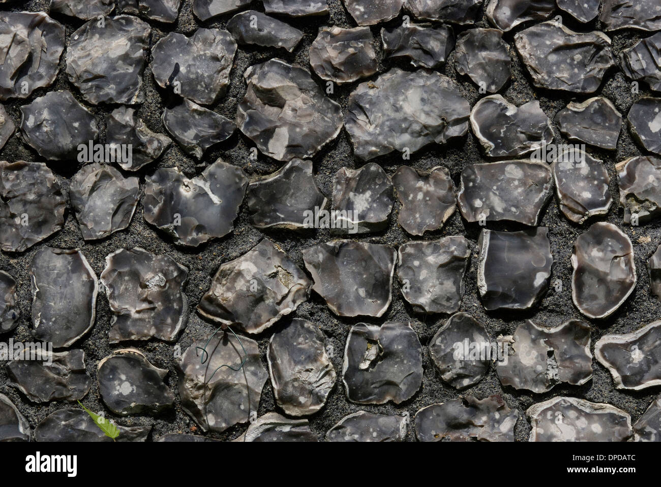 Detail of a polished flint wall in the gardens near the Cathedral, St ...