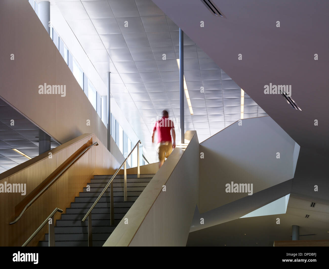 Man walking up stairs in Muenster University Center Building ...