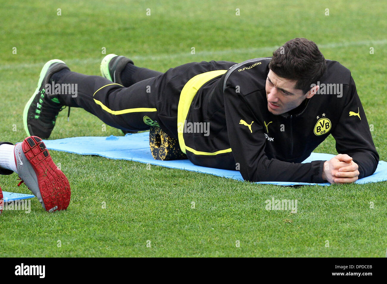 La Manga, Spain. 13th Jan, 2014. Robert Lewandowski stretches during ...
