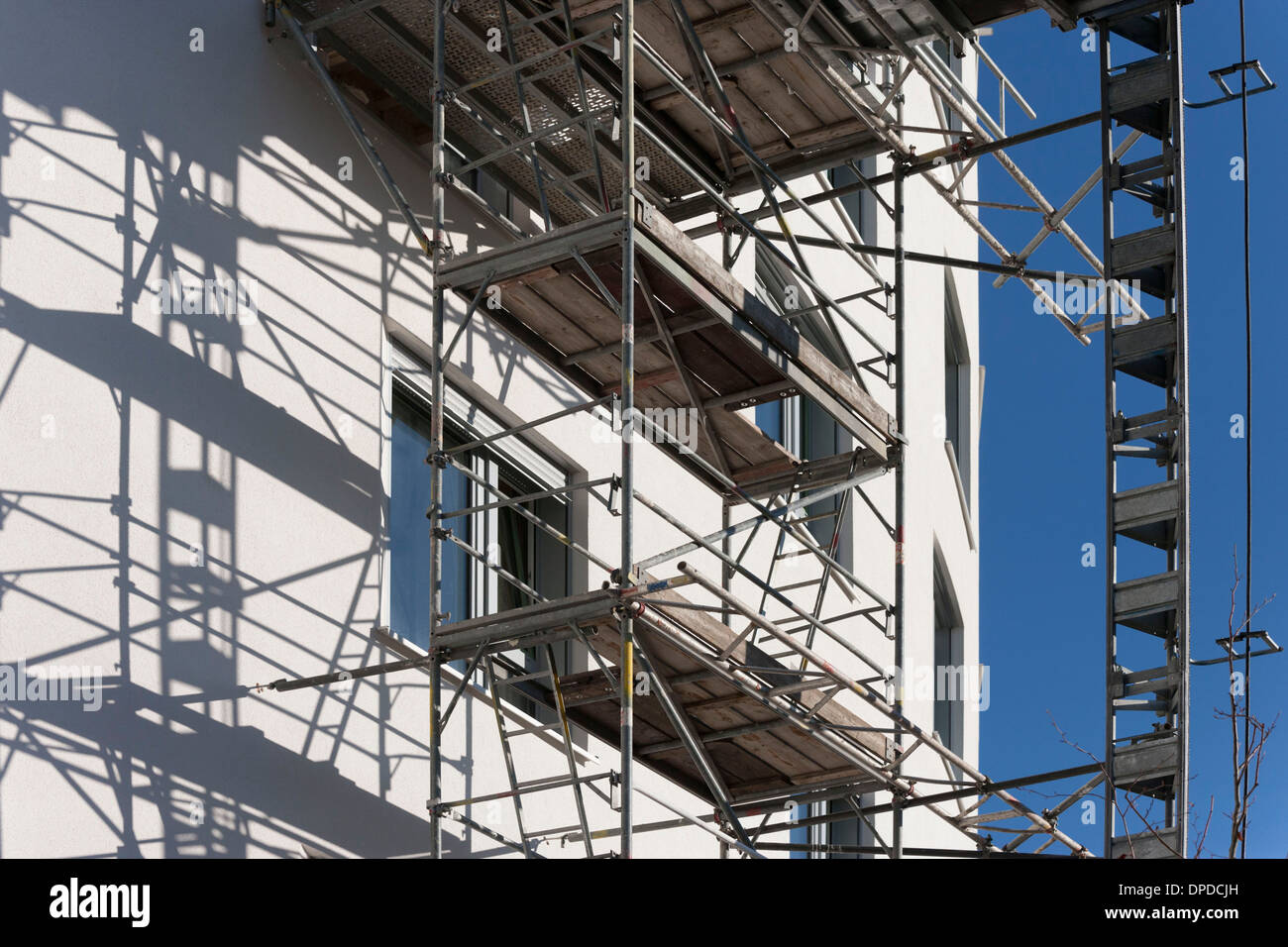 Germany, Bavaria, Munich, scaffold at facade of apartment tower Stock ...