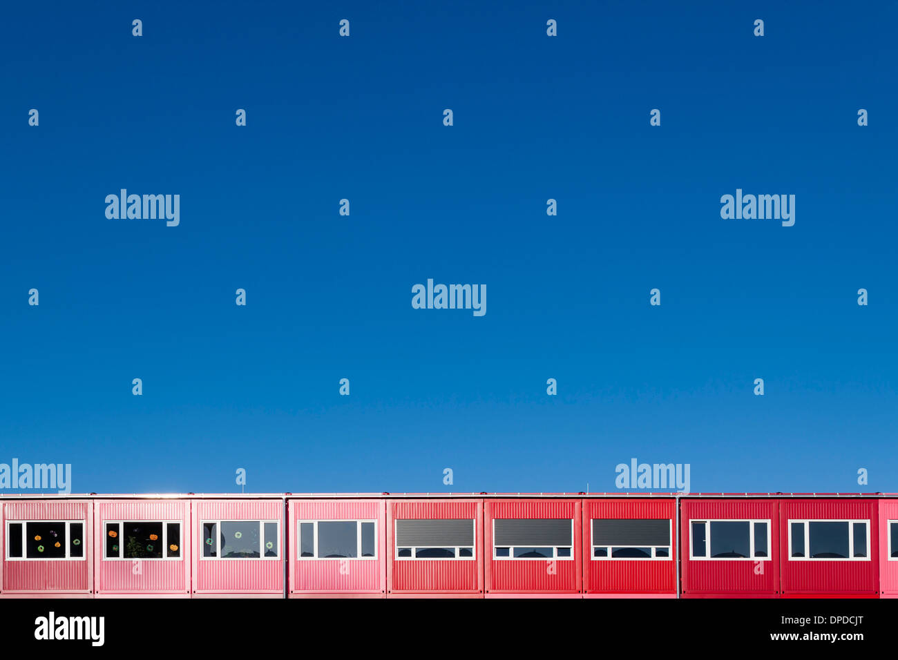 Germany, Bavaria, Munich, red and pink portable buildings using as ...