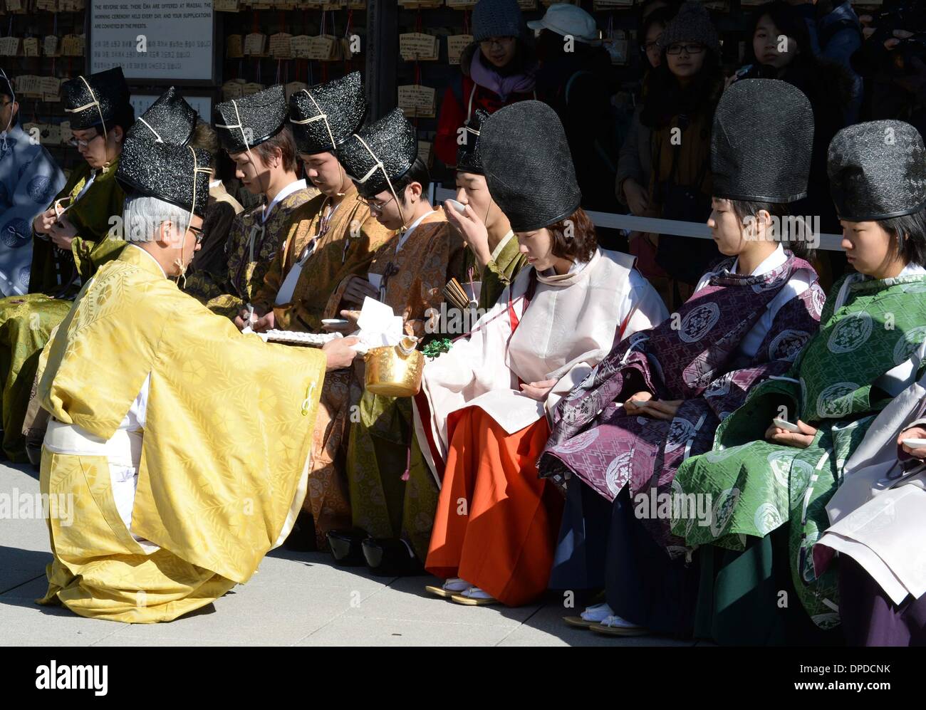 Tokyo, Japan. 13th Jan, 2014. Youths receive drinks during the "Genpuku ...