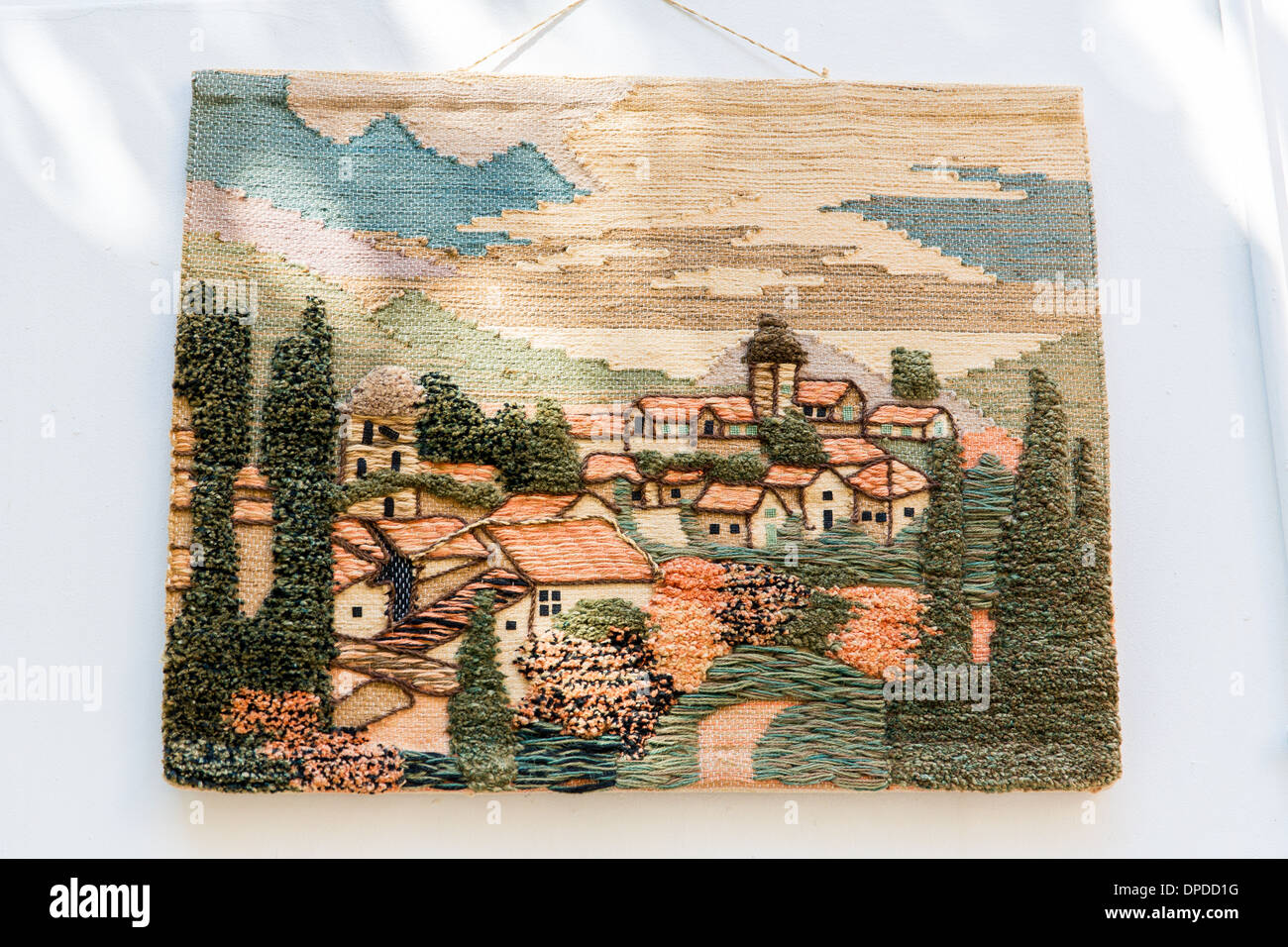 Traditional textiles on a market stall, colorful fabric, handmade ...