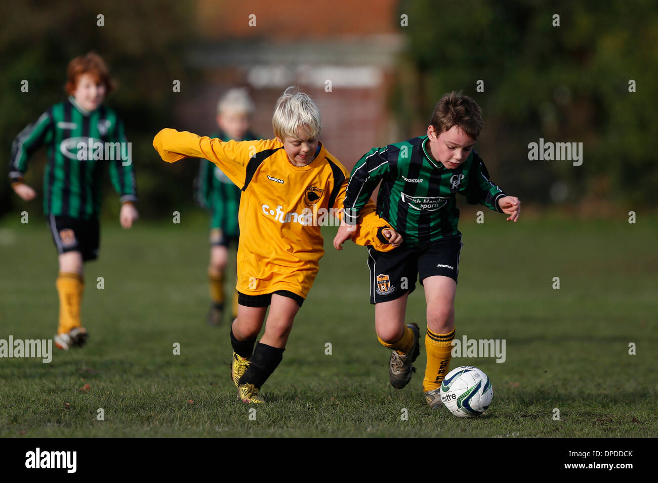 Boys football match coach hi-res stock photography and images - Alamy