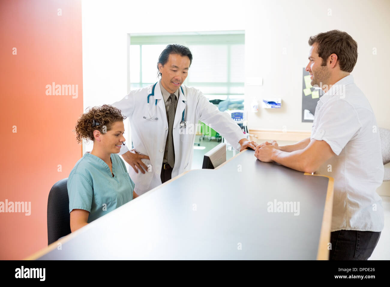 Male receptionist working doctor hi-res stock photography and images ...