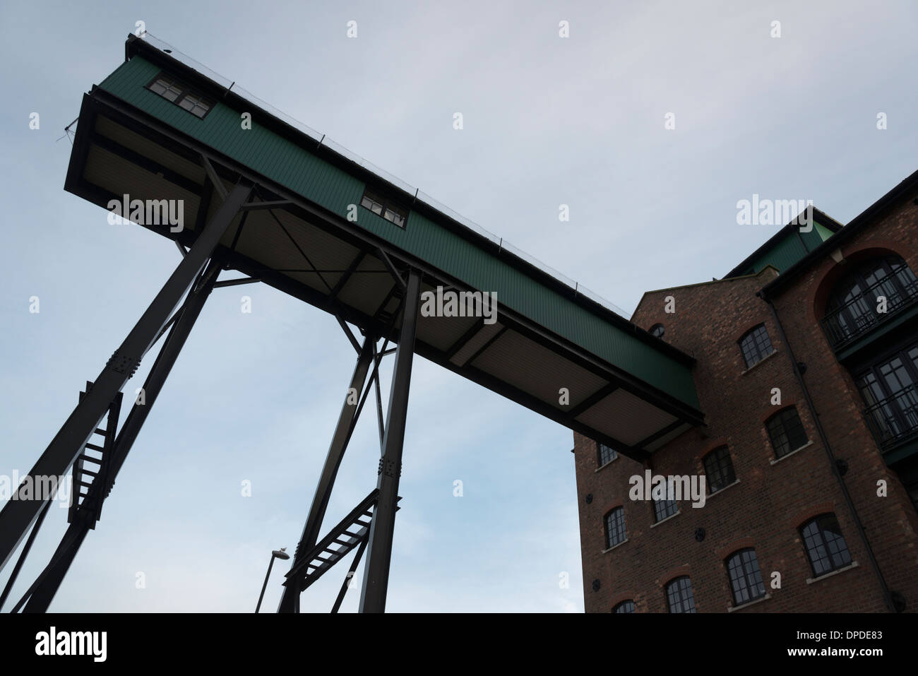 Old granary building and overhanging gantry Well next the Sea Norfolk ...