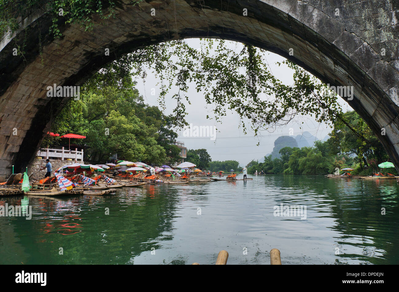 Bamboo rafts and a bridge in Yangshuo, Guilin, China Stock Photo - Alamy