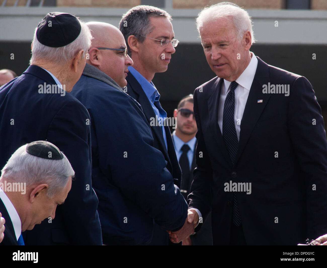 U.S. Vice President, Joe Biden (R), shakes hands with Gilad Sharon (C ...