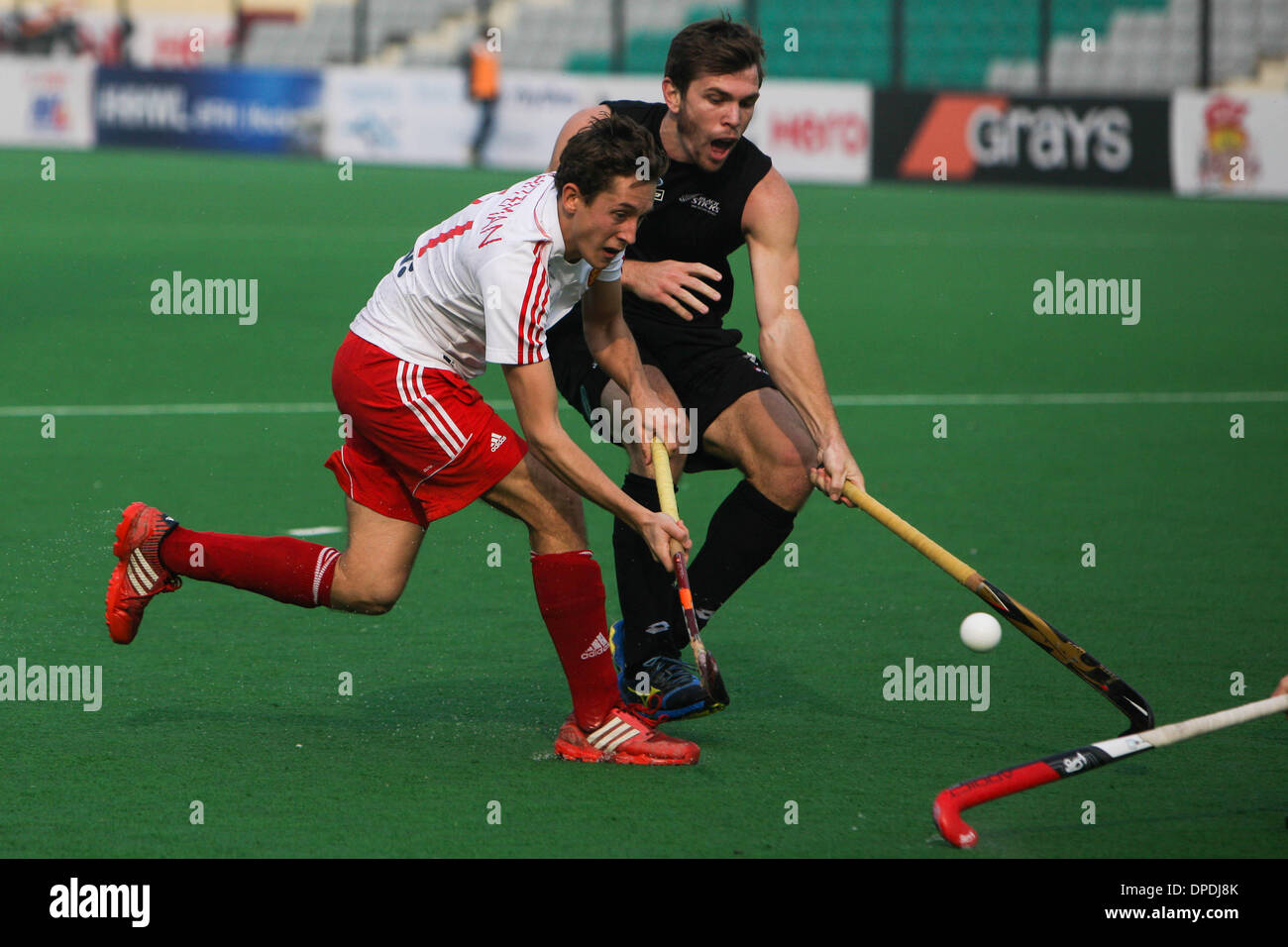 New Delhi, India. 13th Jan, 2014. England player Tim Whiteman (L ...