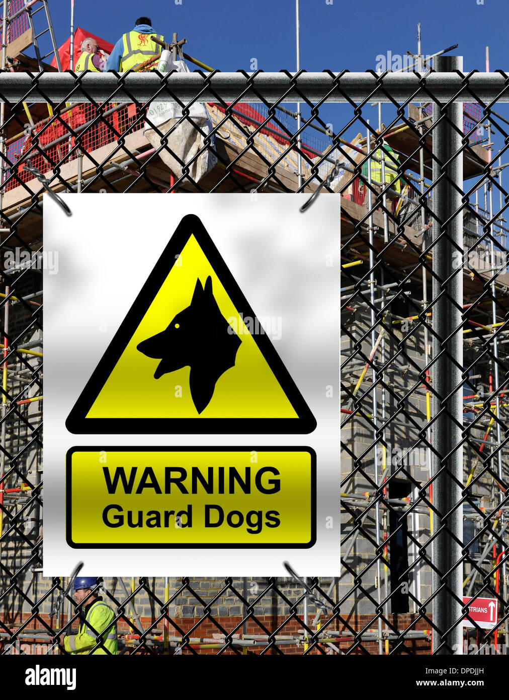 Building site security notice with ‘WARNING Guard Dogs’ sign fixed to ...