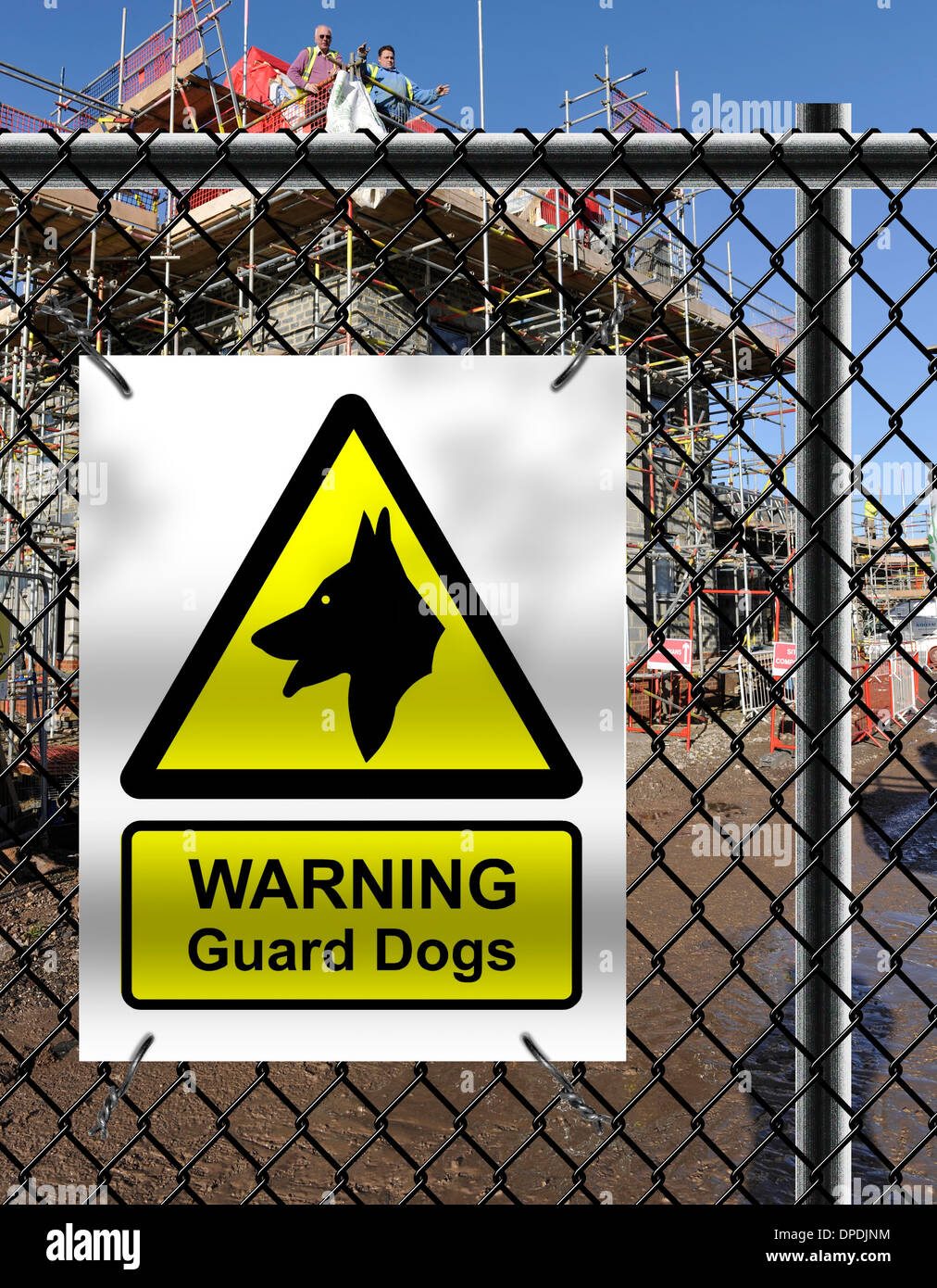 Building site security notice with ‘WARNING Guard Dogs’ sign fixed to ...