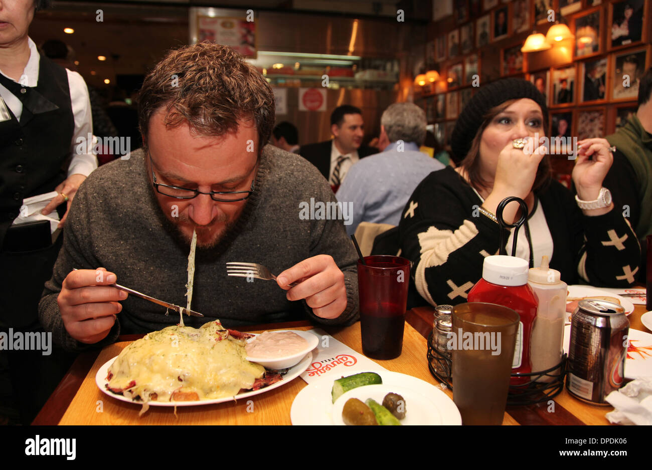 Fat man eating restaurant hi-res stock photography and images - Alamy